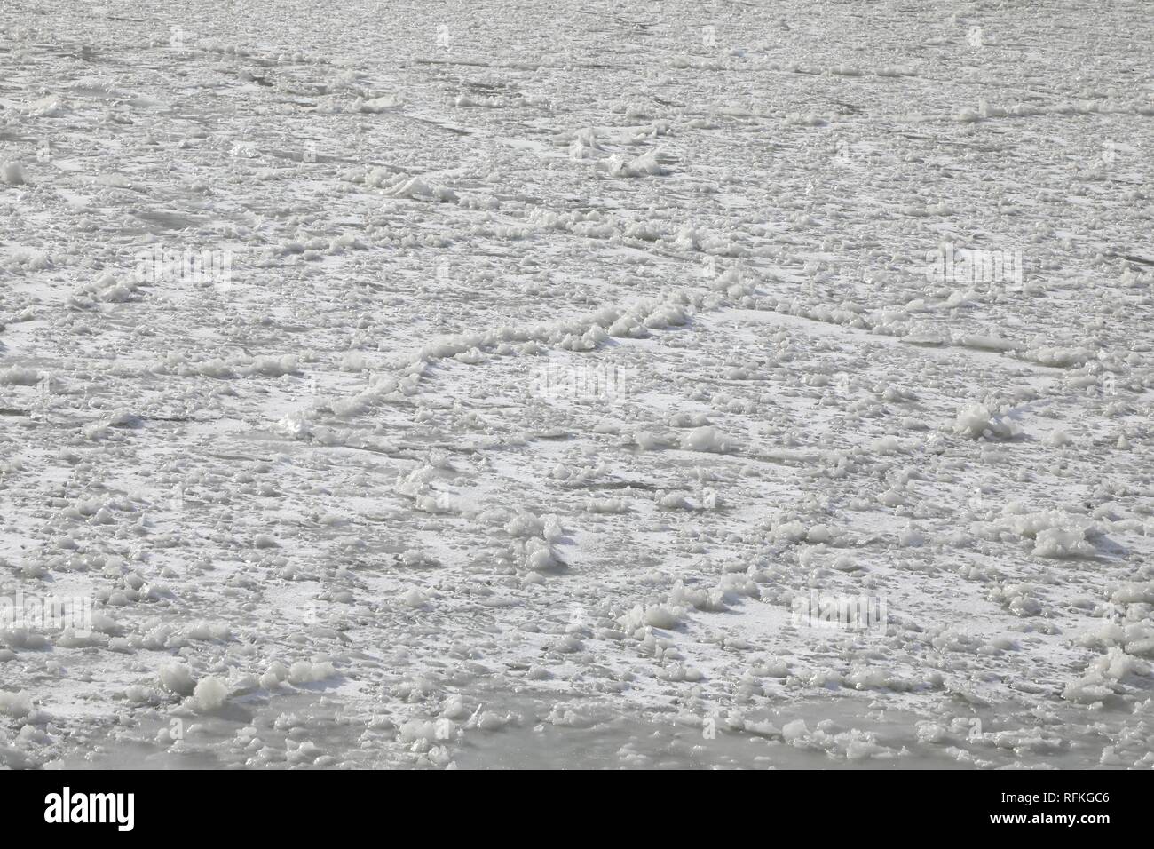 Ice surface on the frozen water Stock Photo - Alamy