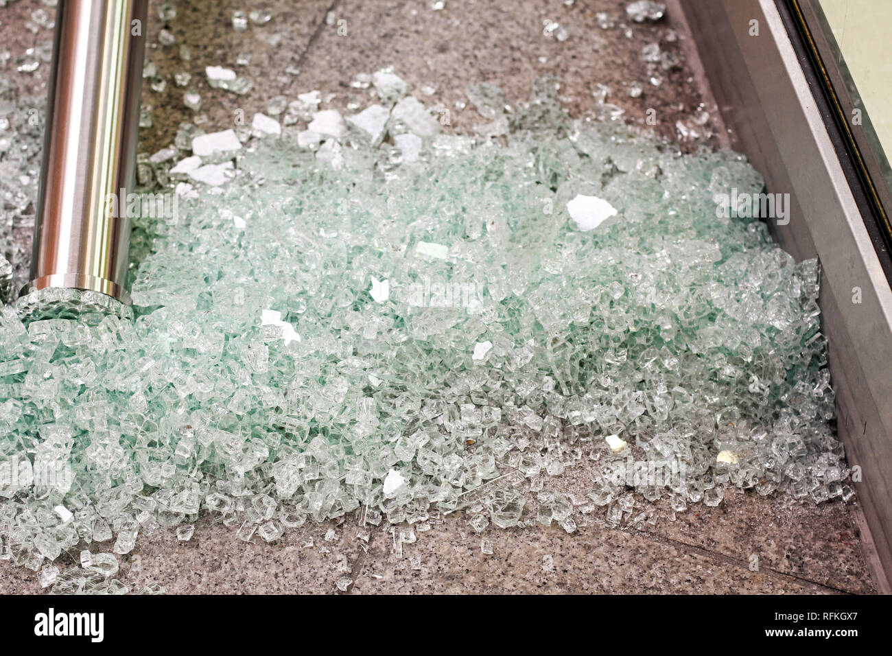 Big pile of scattered window after destruction damage Stock Photo - Alamy