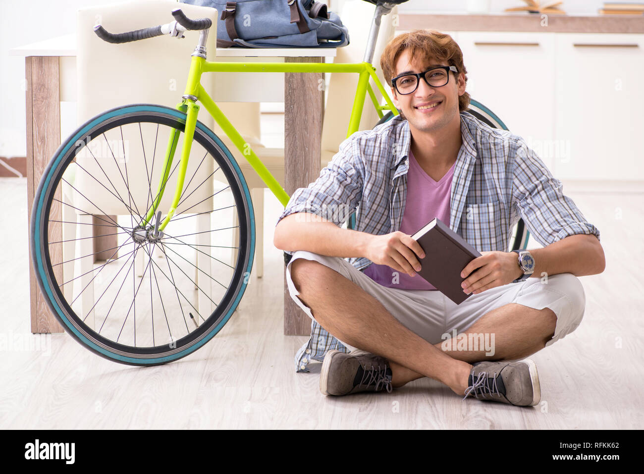 Student commuting to university using cycle Stock Photo - Alamy