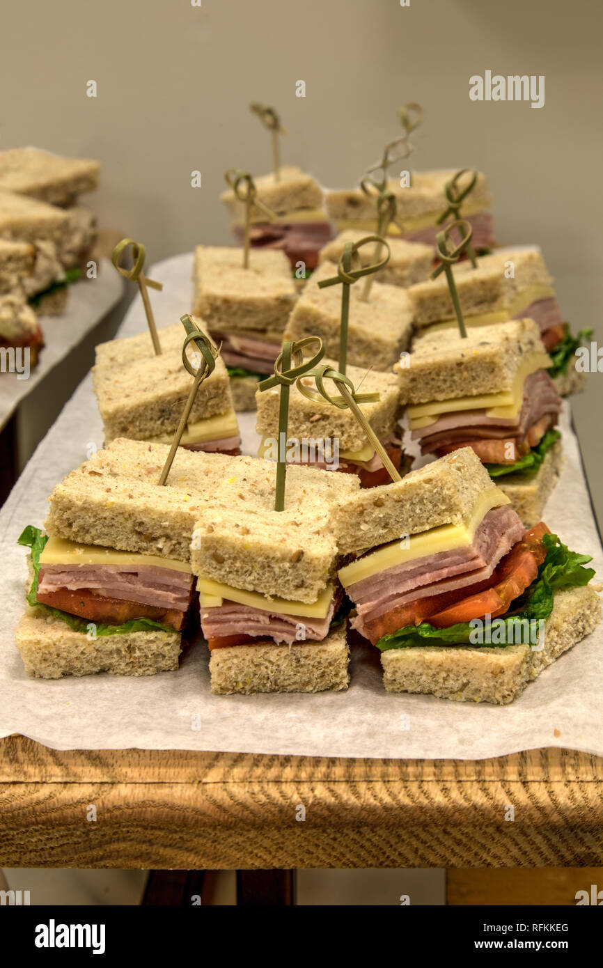 Ham and cheese sandwich with the bread crust cut off and made into ...