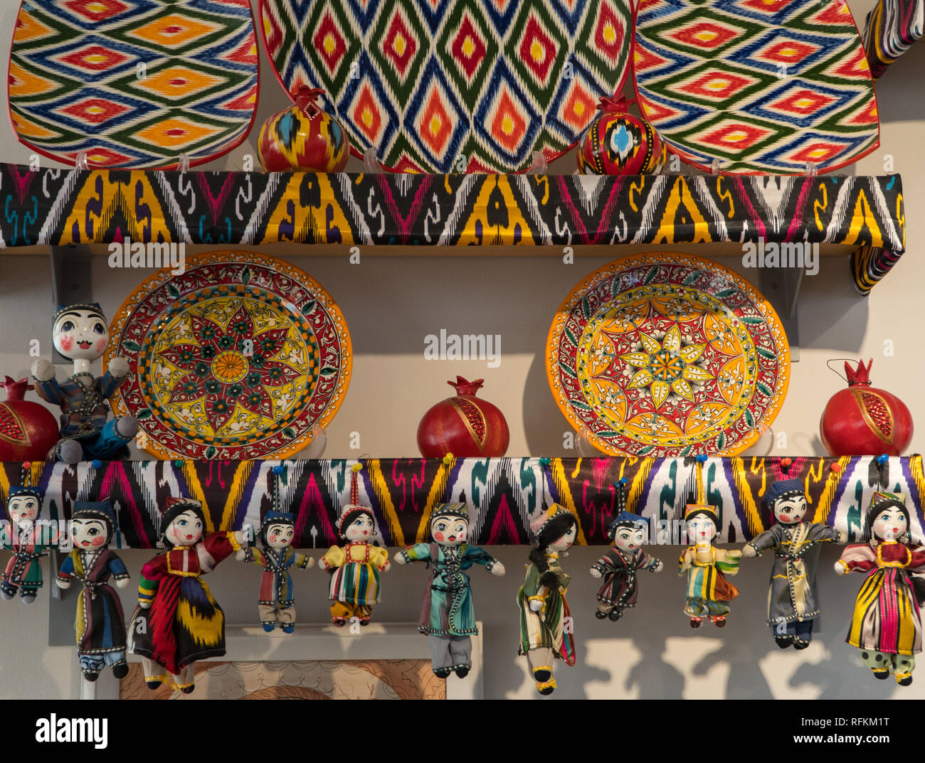 dolls and dishes in traditional Oriental ornaments. national uzbek ...