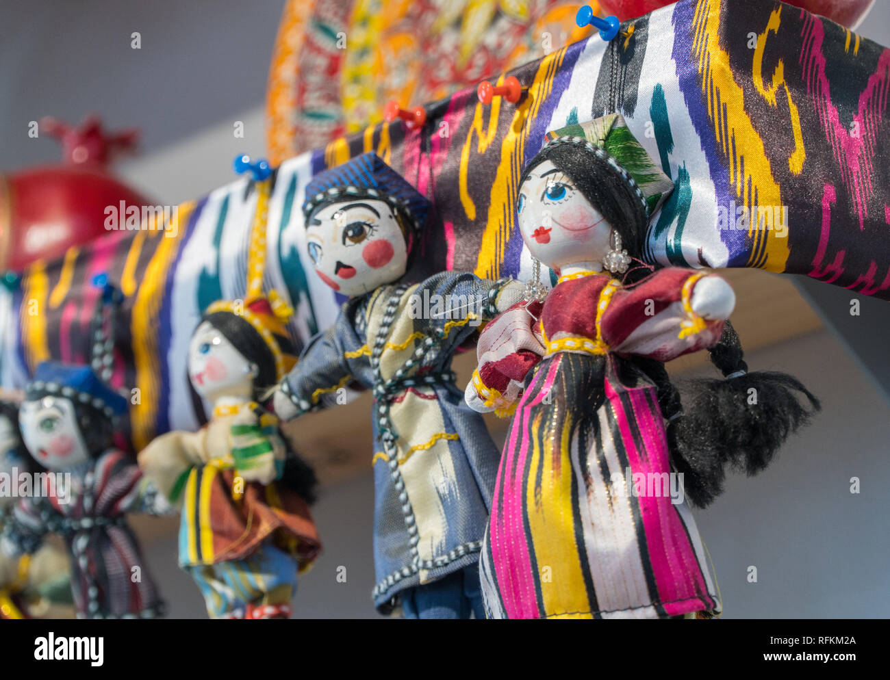 dolls in traditional Oriental outfits. national uzbek souvenirs Stock ...