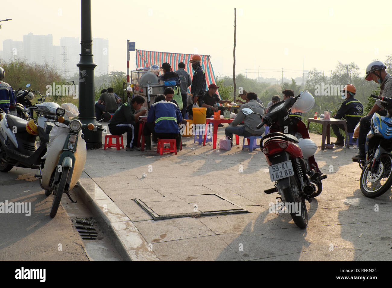 HO CHI MINH CITY, VIET NAM- NOV 2, 2018: Vietnamese worker have ...