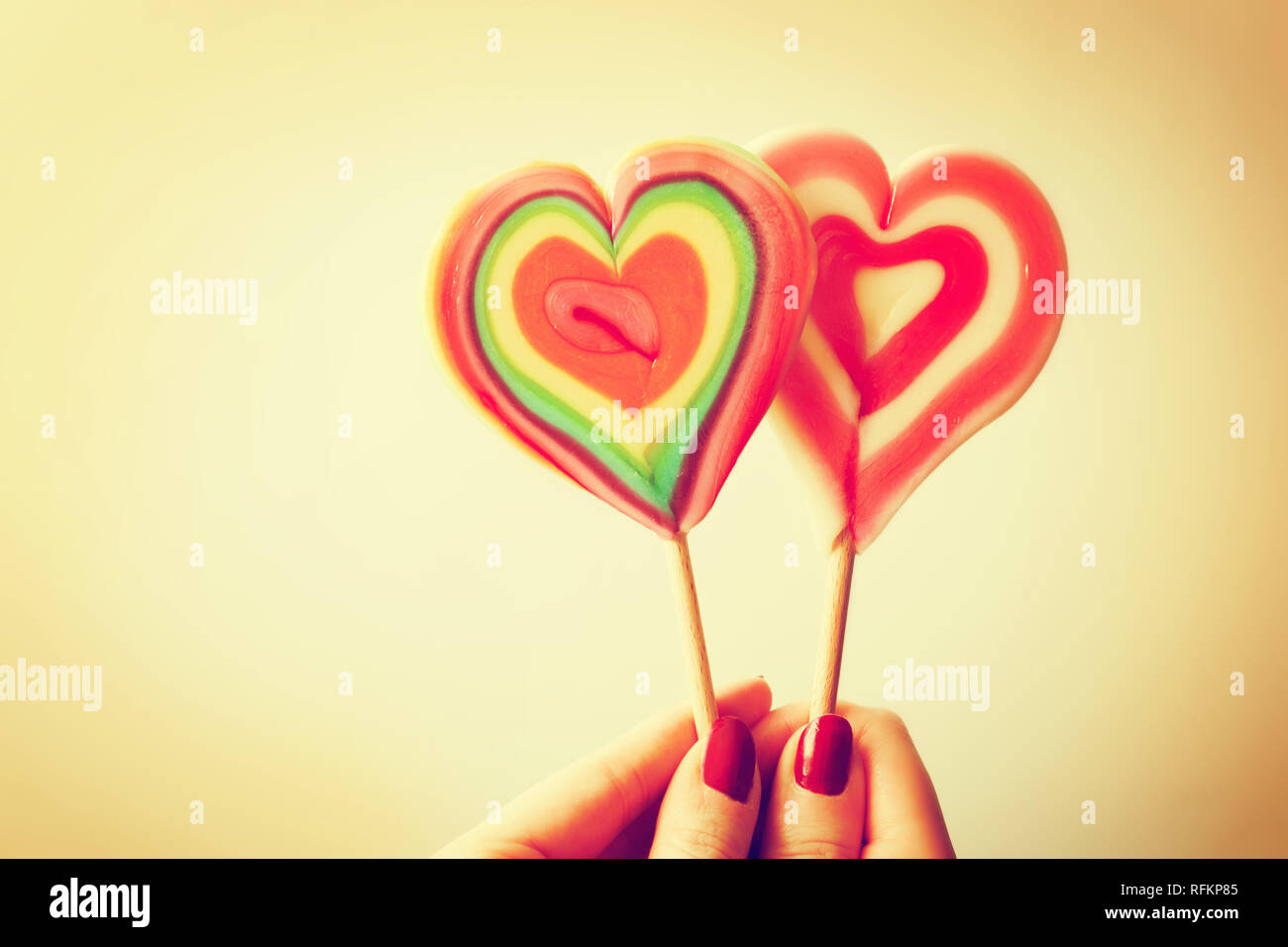 Woman heart shaped lollipops in hi-res stock photography and images - Alamy