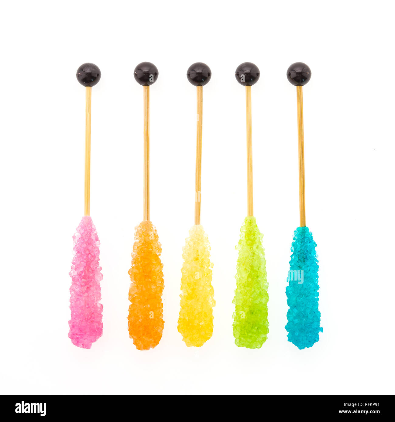 Crystal sugar stick isolated on white background Stock Photo - Alamy