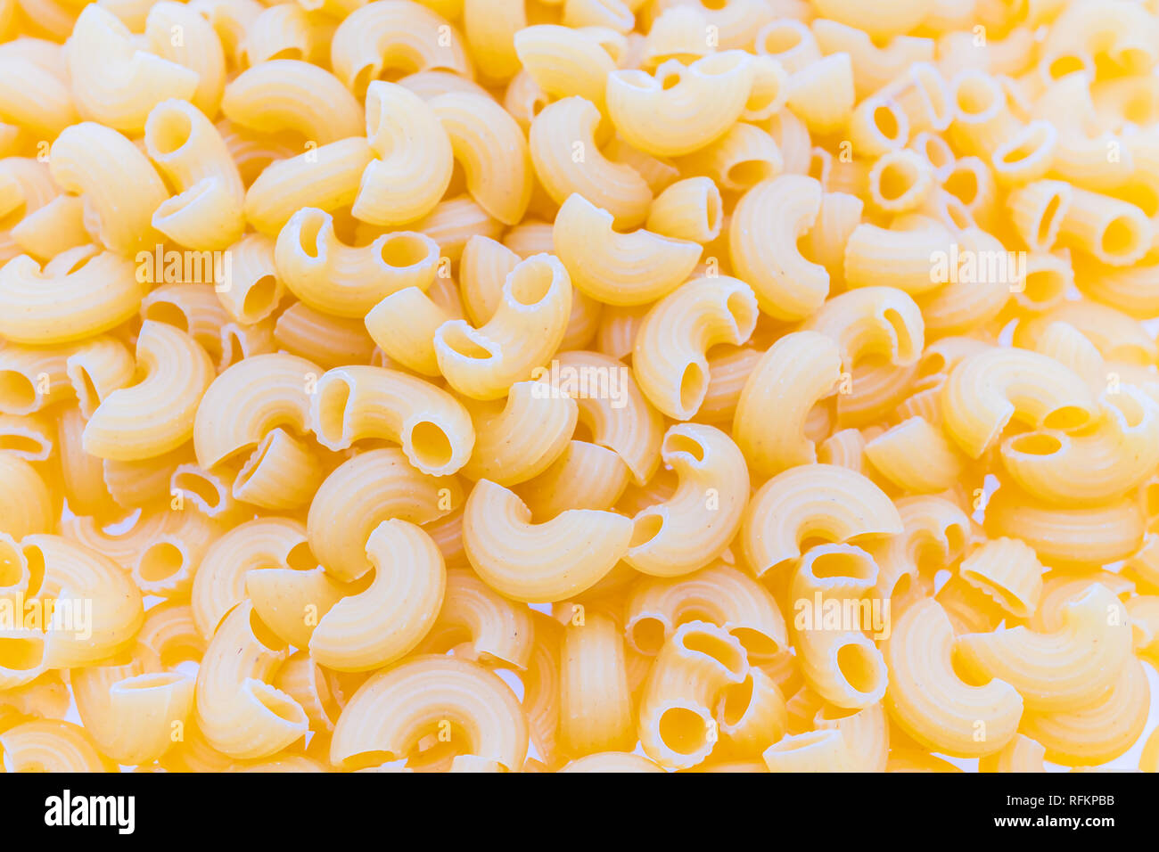 Yellow dry pasta and spaghetti textures background for italian food ...