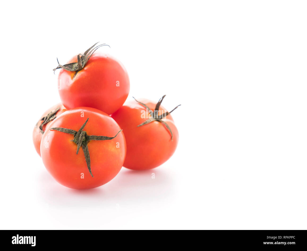 fresh tomato on white background Stock Photo - Alamy