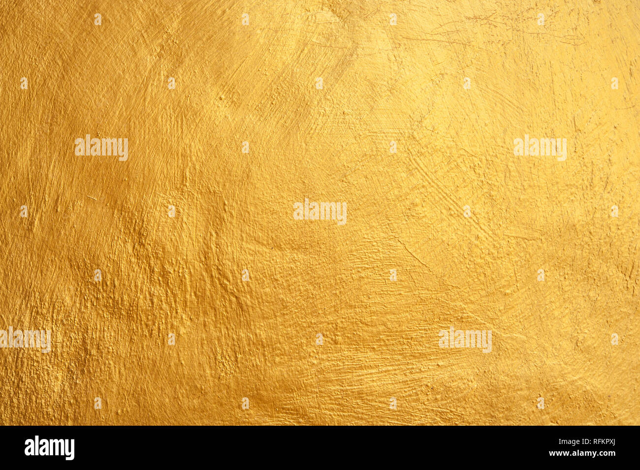 Golden concrete wall background Stock Photo - Alamy