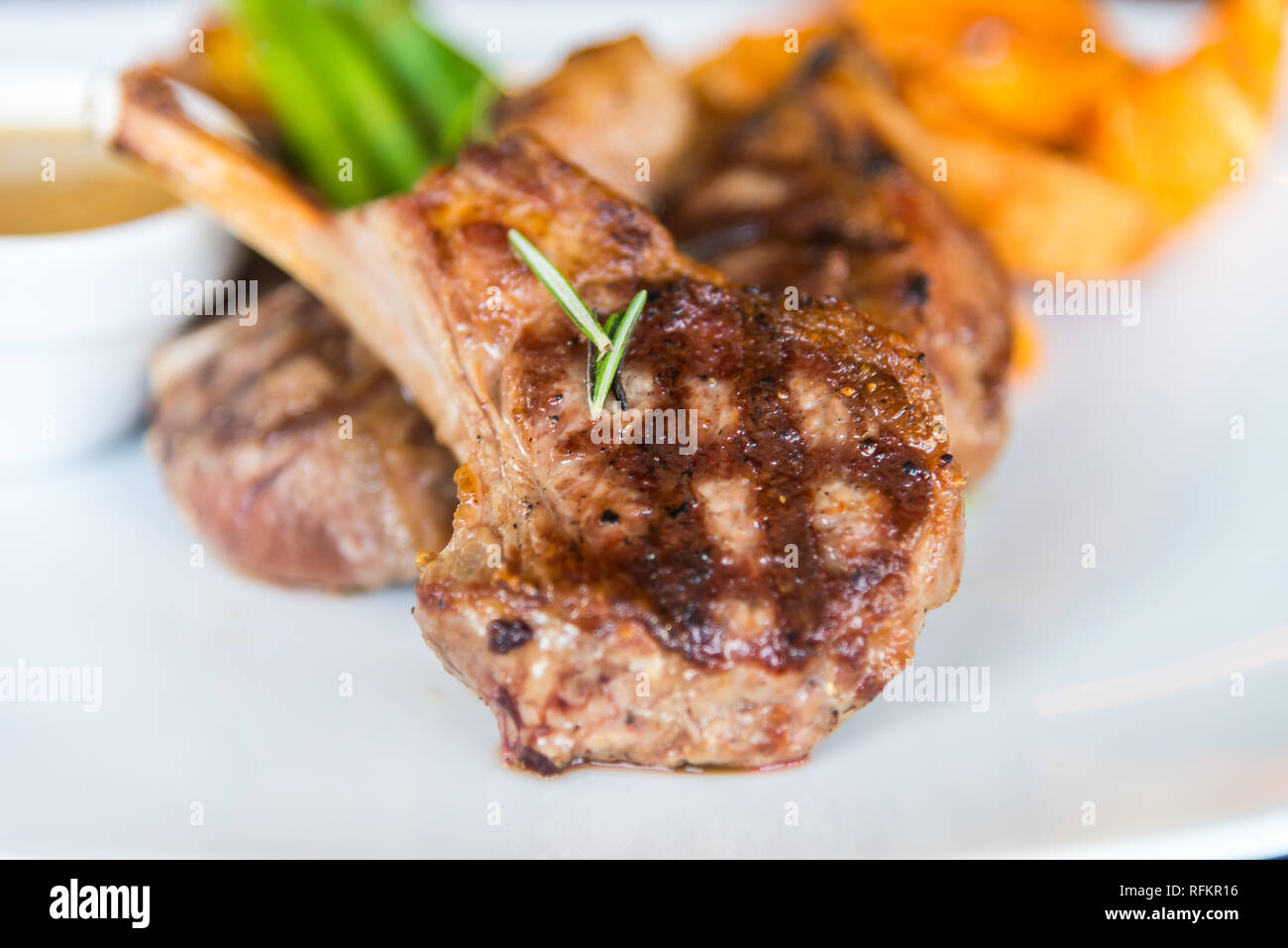 Grilled meat lamp steak - soft focus point Stock Photo - Alamy