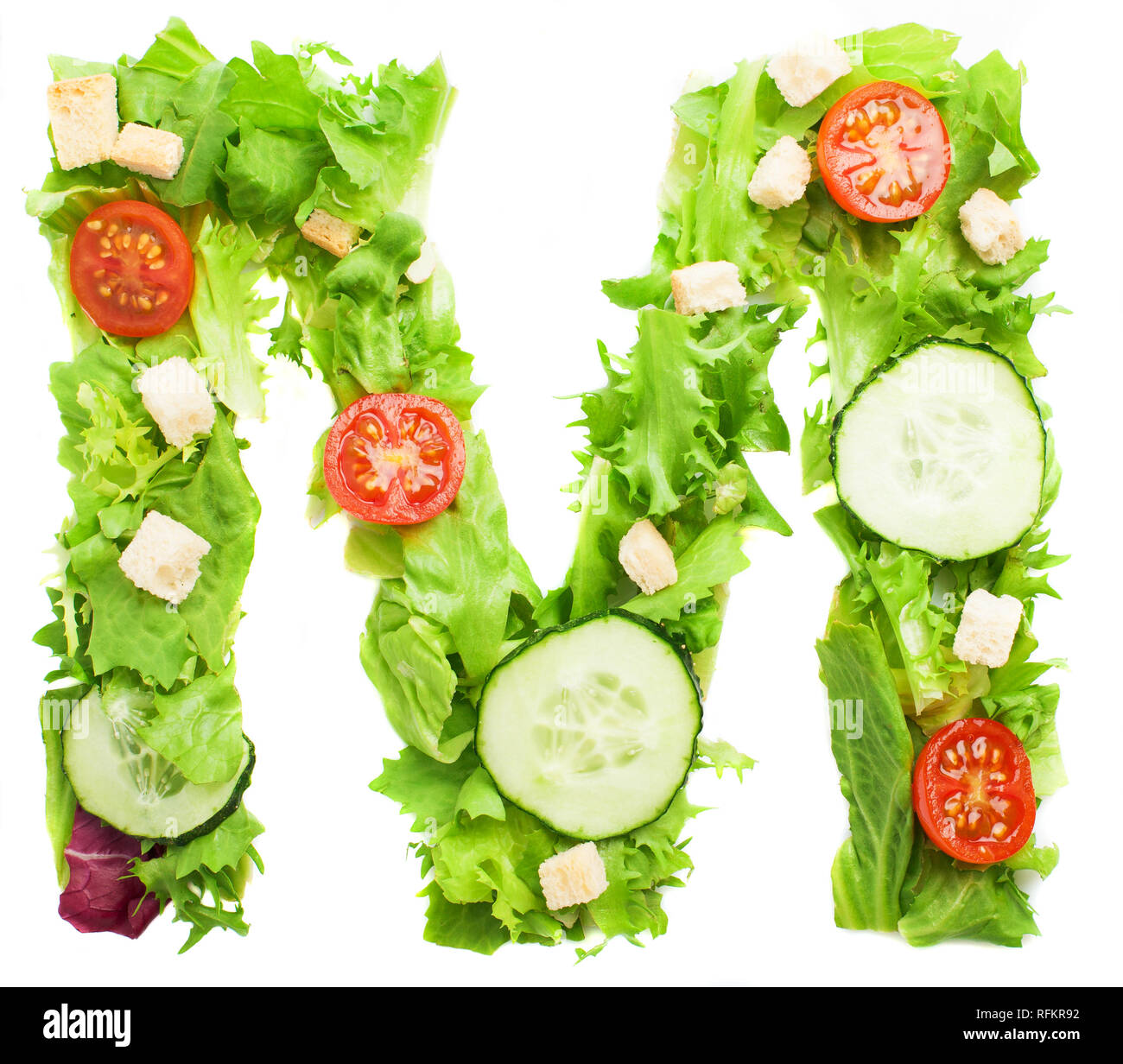 M letter made with salad isolated on white Stock Photo - Alamy