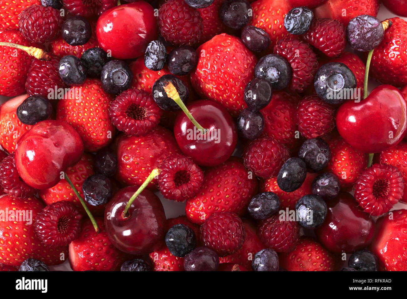 Mixed berries closeup. Top view Stock Photo - Alamy