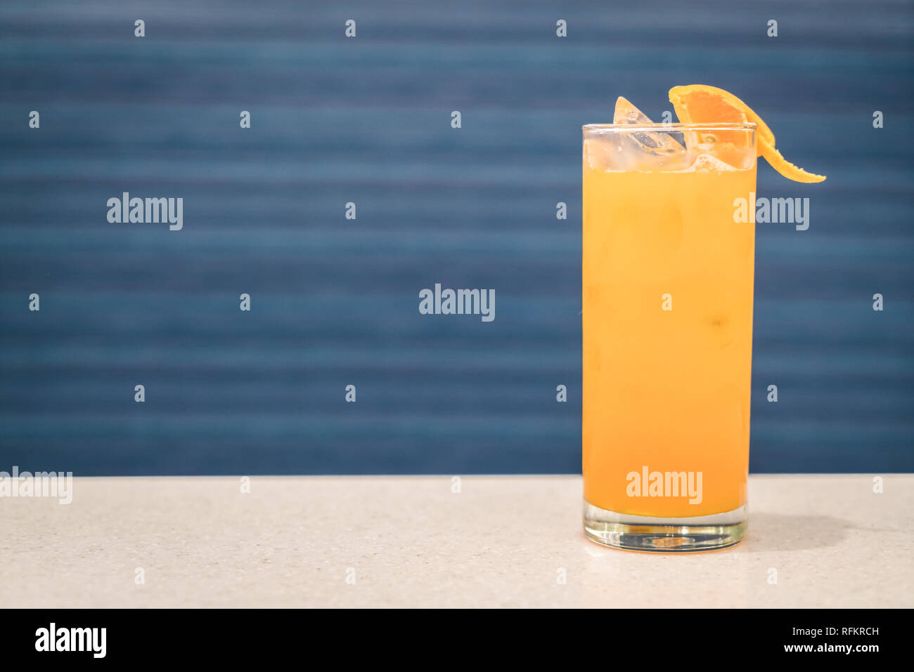 Orange juice glass - filter effect Stock Photo - Alamy