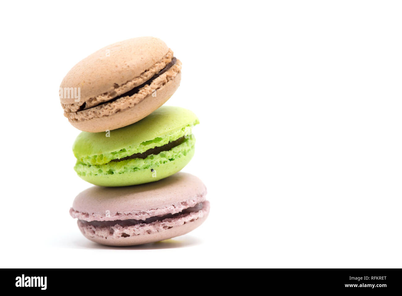 Pile of colorful macarons isolated white background Stock Photo - Alamy