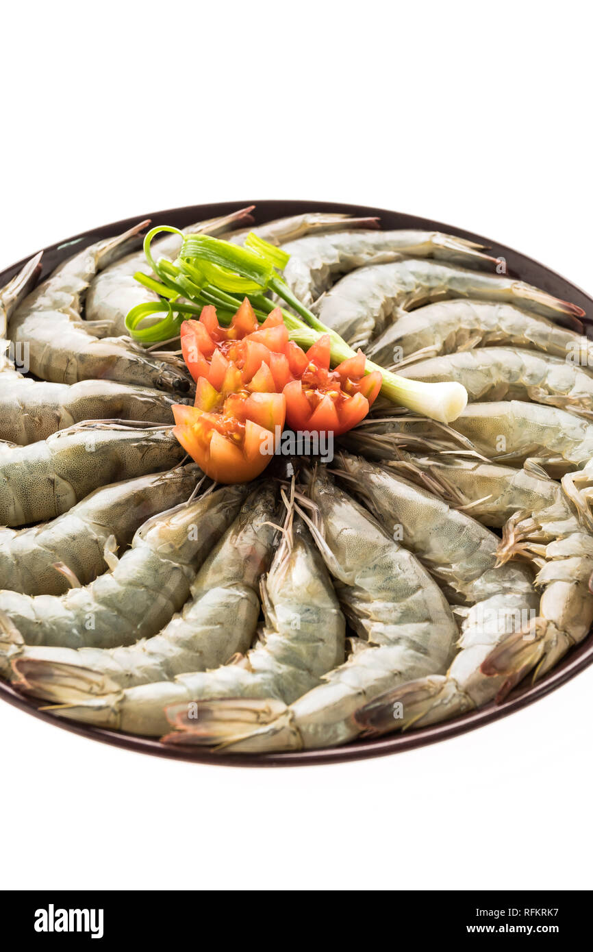 Raw prawn and shrimp in plate isolated on white background - Seafood ...