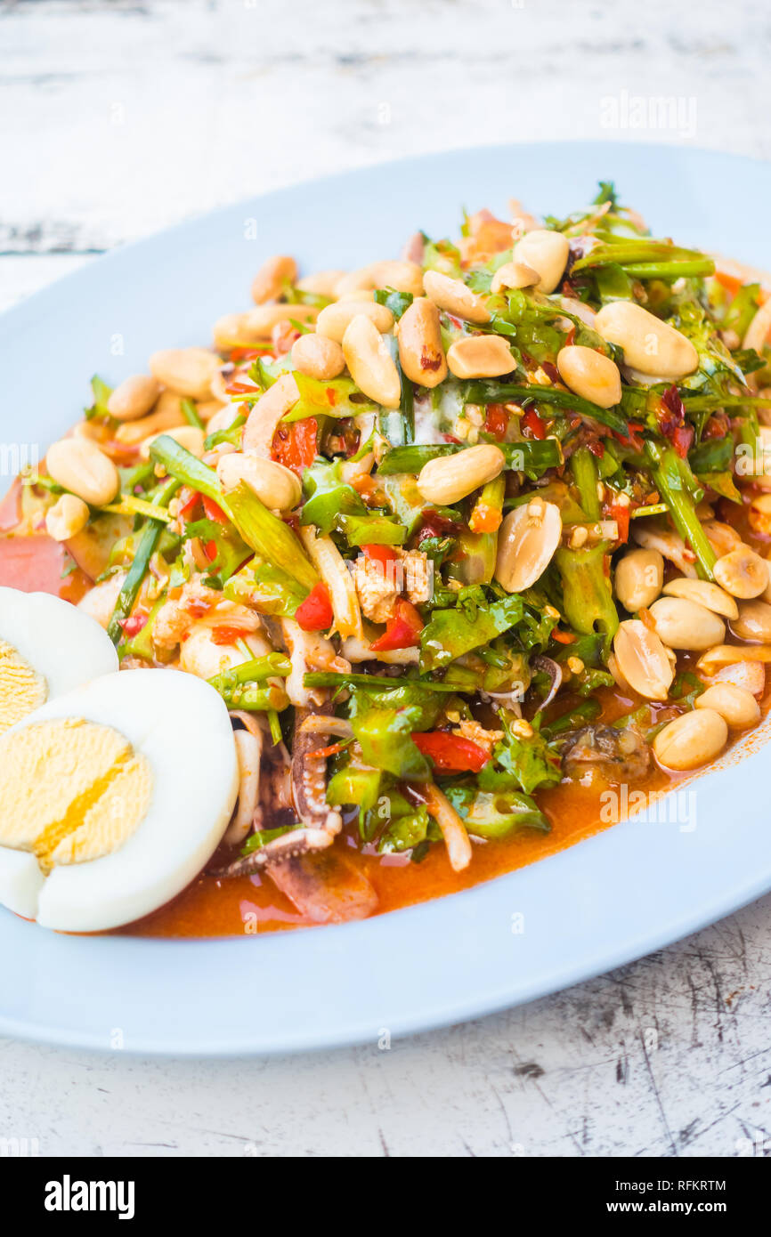Spicy winged bean salad - Thai food style Stock Photo - Alamy