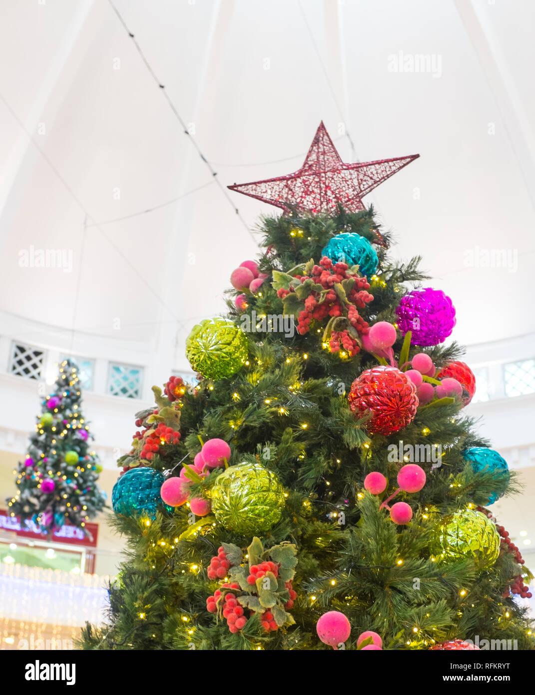 Christmas tree with colorful balls and decorations Stock Photo - Alamy