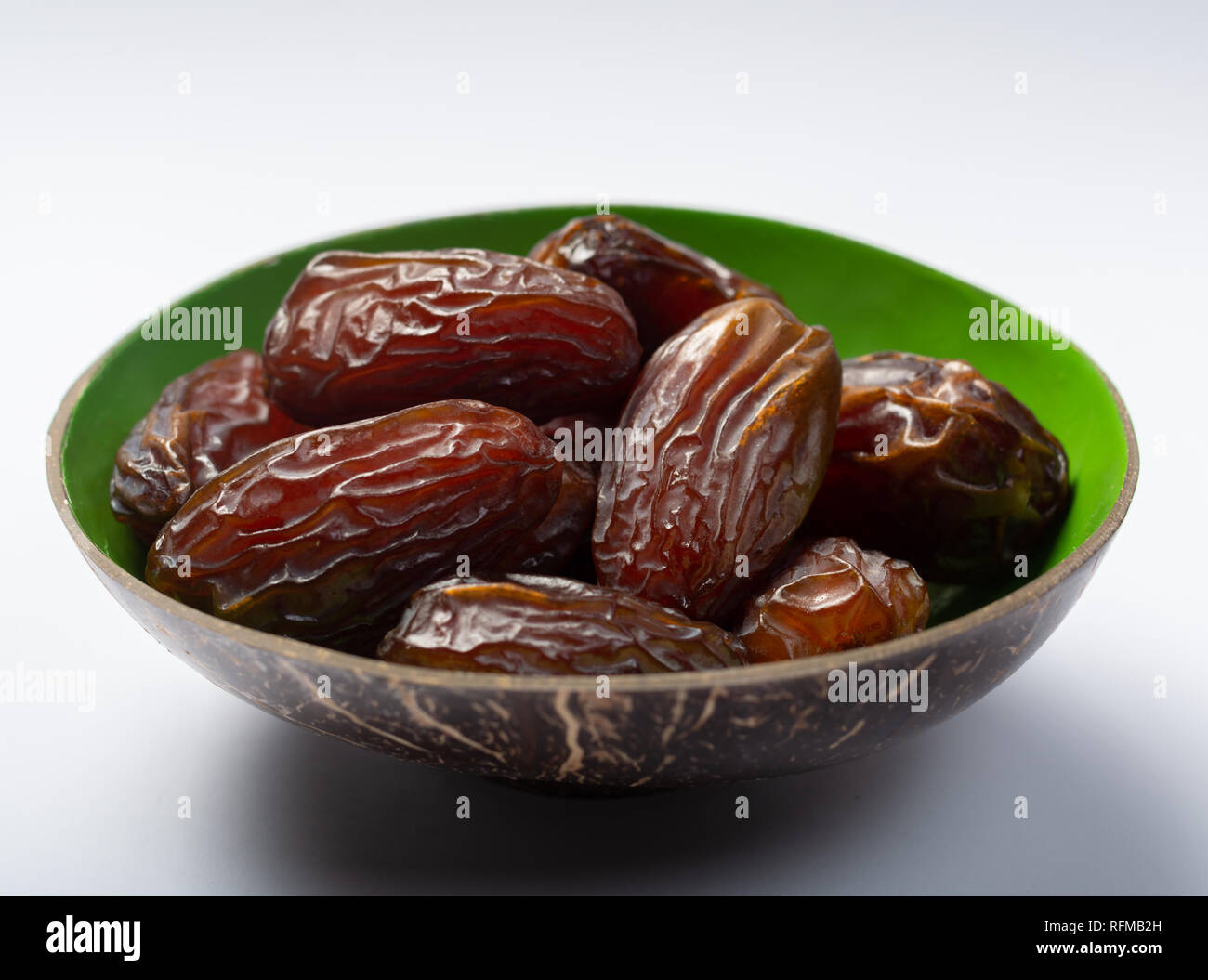 Pile of sweet tasty dried dates fruits close up, isolated Stock Photo ...