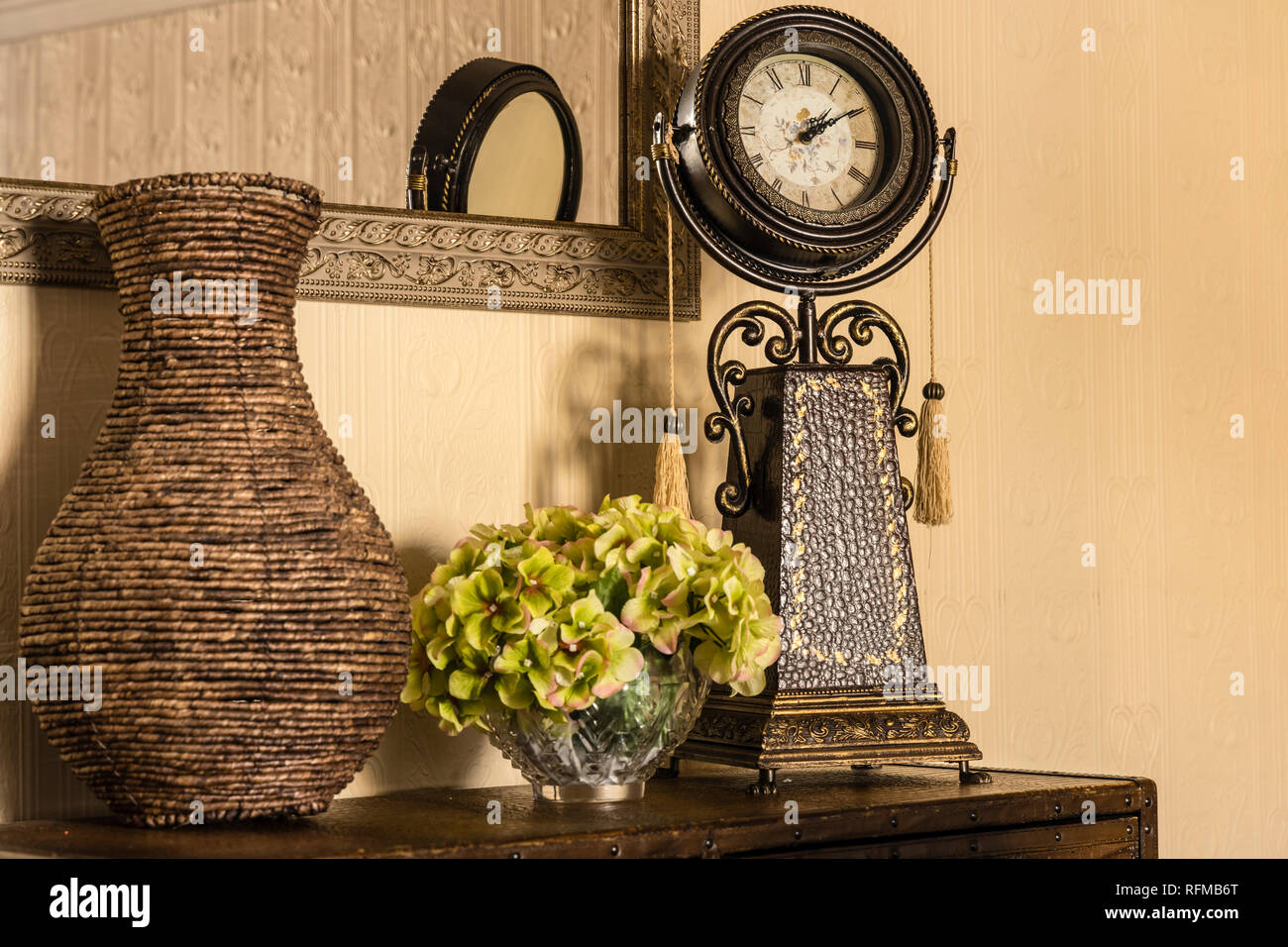 Interior decor arrangement with mirror, clock, vase and floral Stock ...