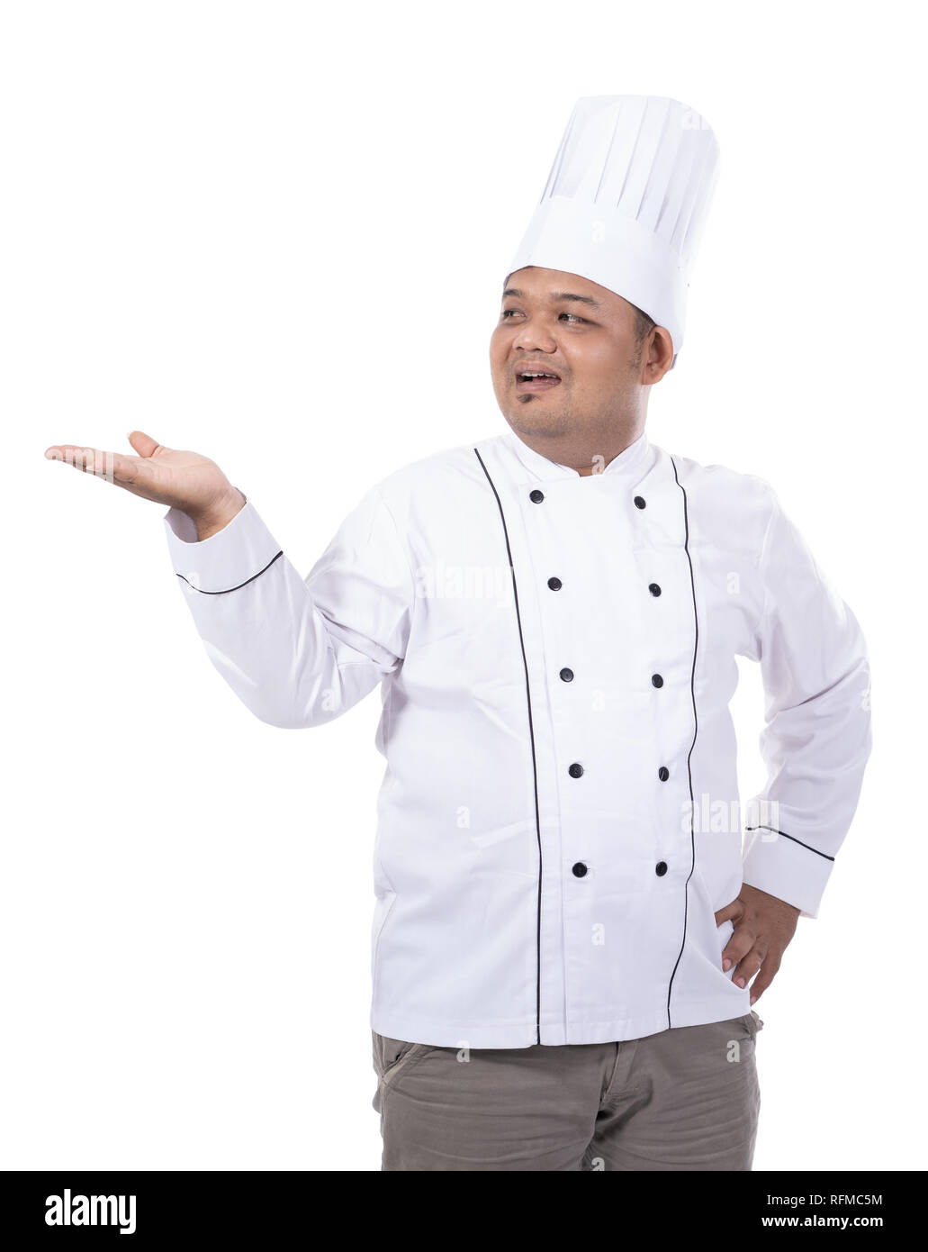 portrait of asian chef pose serves something with his hands Stock Photo ...