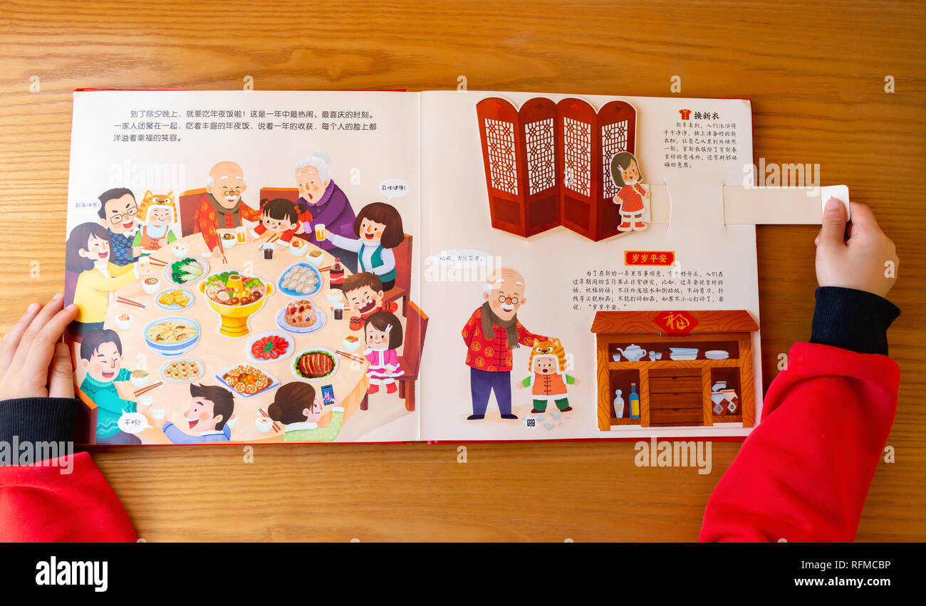 Zhongshan,China-January 26,2019:kid reading 3D books introducing ...