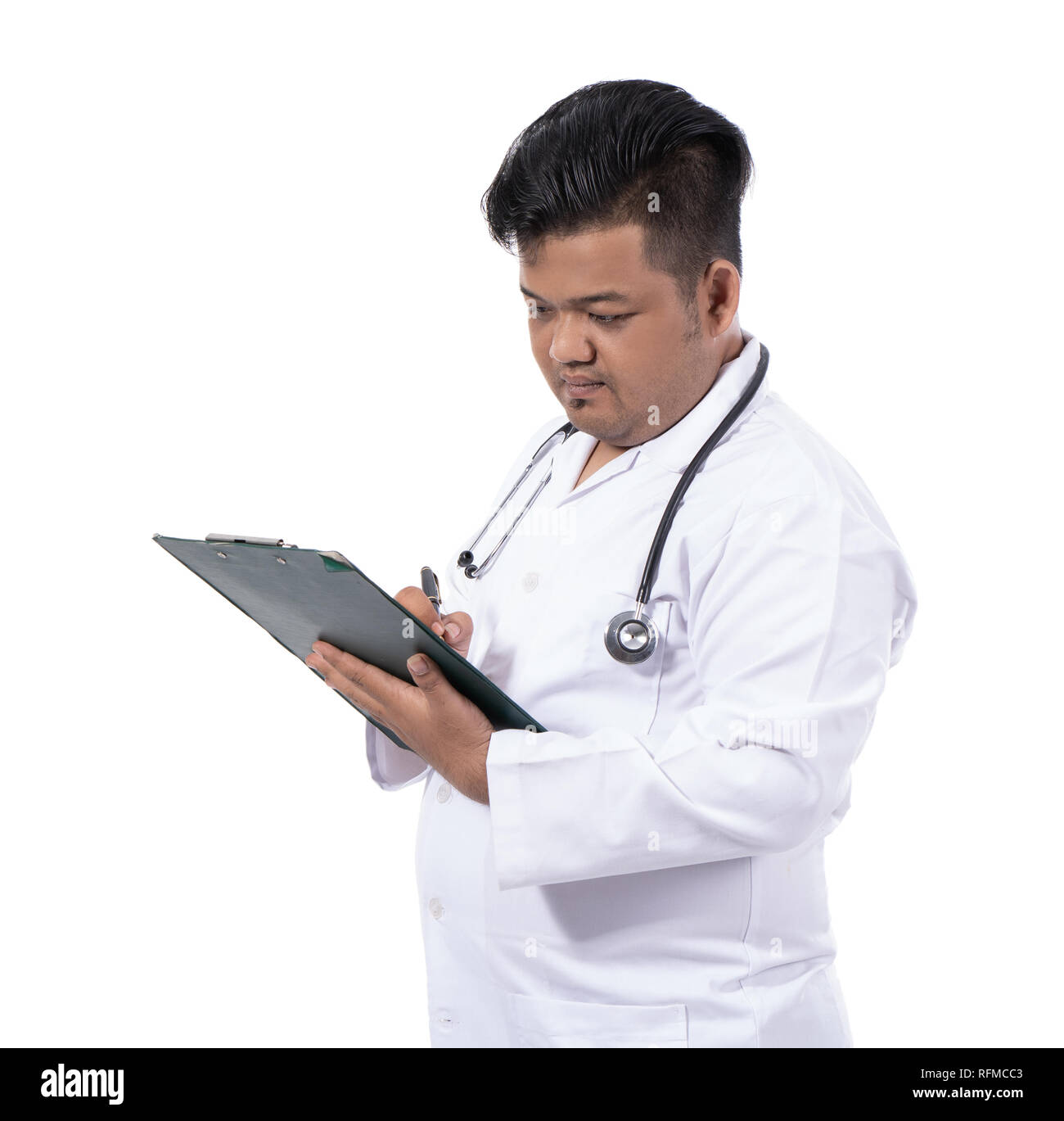 images of serious doctor write a diagnosis Stock Photo - Alamy