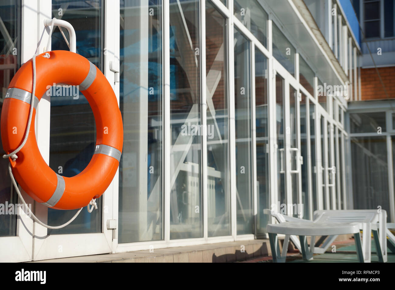 Lifebuoy in the swimming pool Stock Photo - Alamy