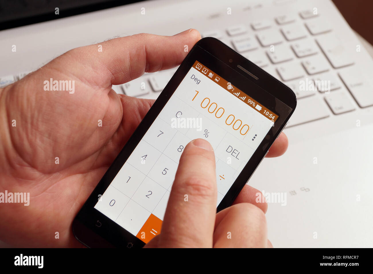 To reach one million in calculations on the calculator Stock Photo - Alamy