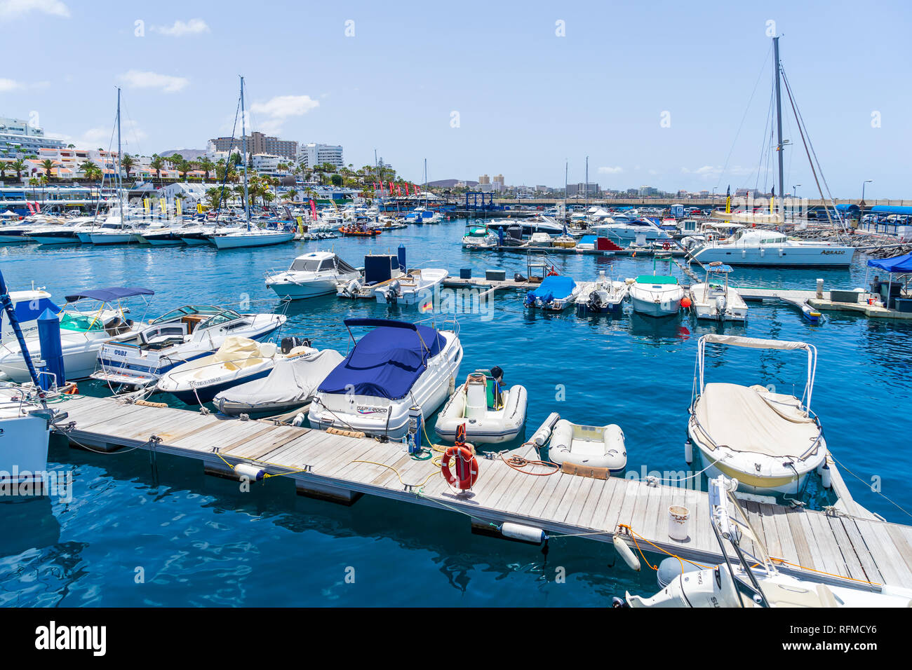 COSTA ADEJE, TENERIFE, CANARY ISLANDS, SPAIN - JULY 26, 2018: Sea port ...
