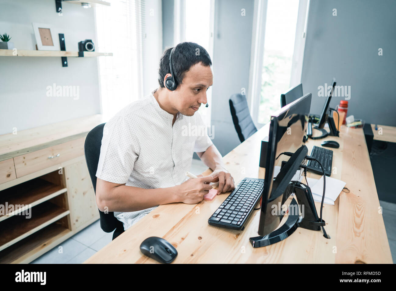 portrait of telecommunication worker happy when do the work Stock Photo ...