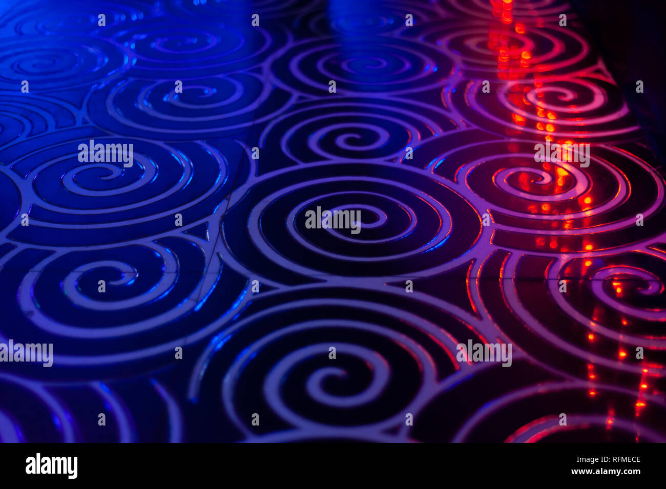 club dance floor interior. spiral tile background whith bokeh ...