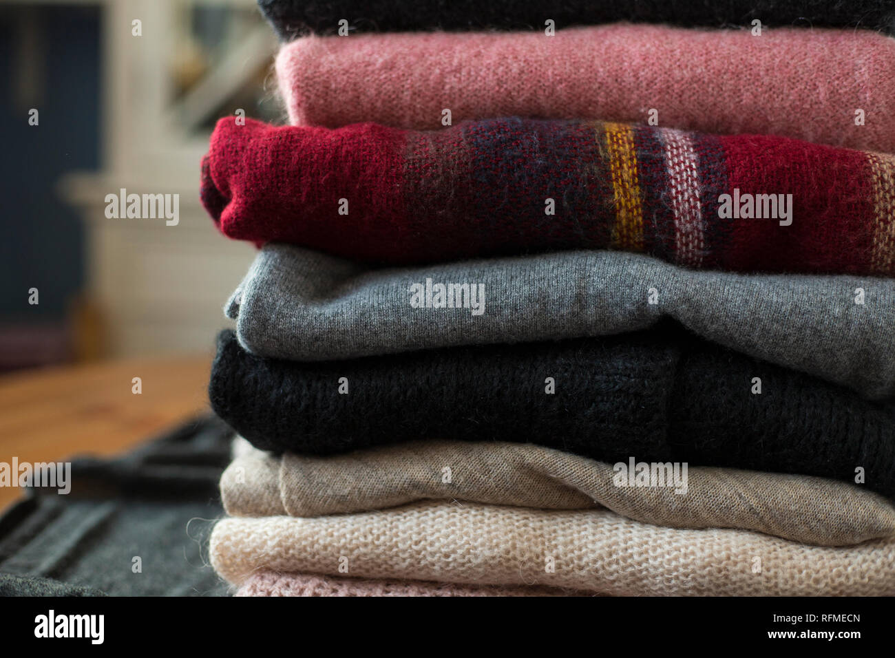Pile of sweaters hi-res stock photography and images - Alamy