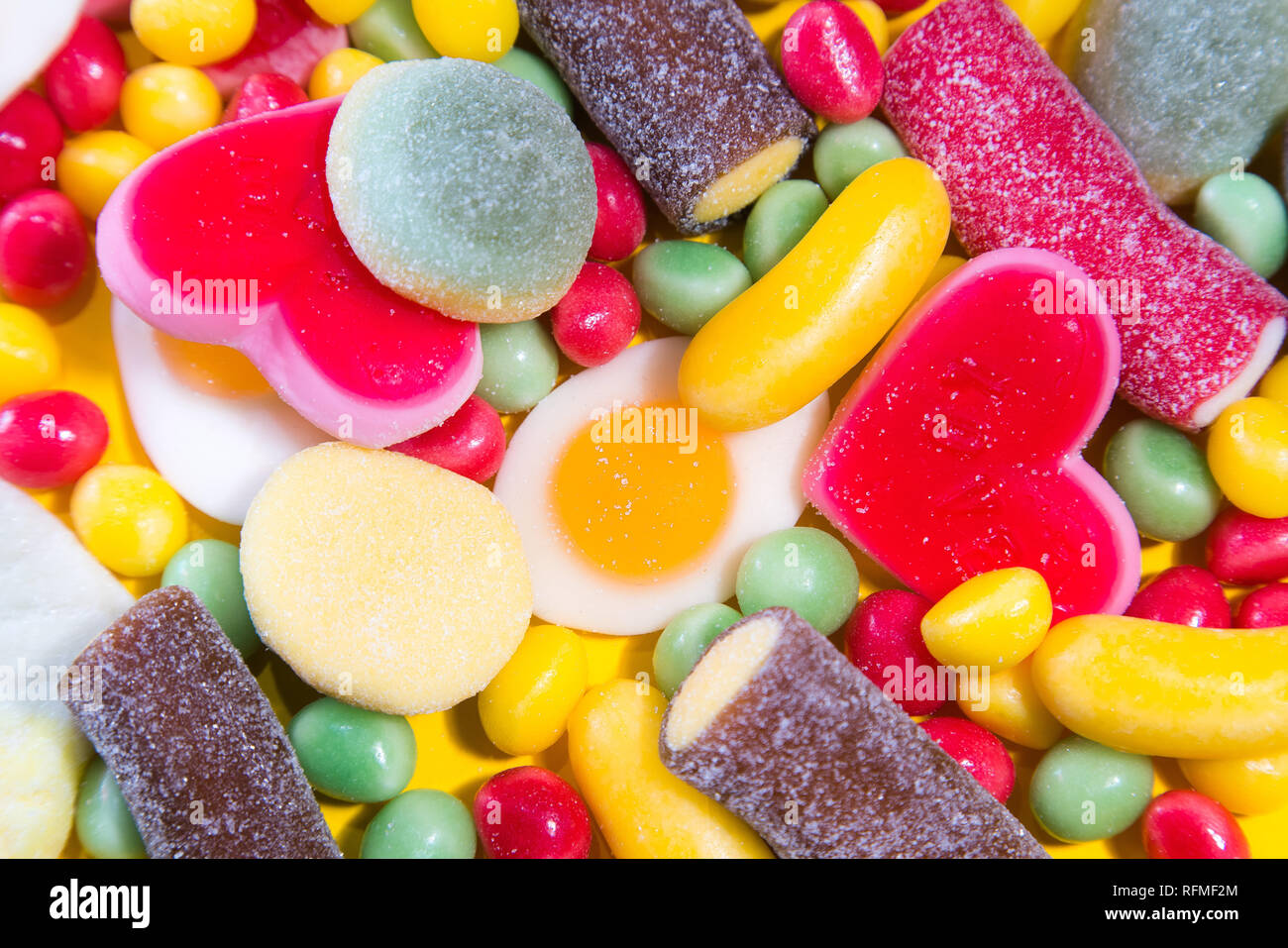 Pile of delicious colorful chewing candies background. Colourful sweets ...