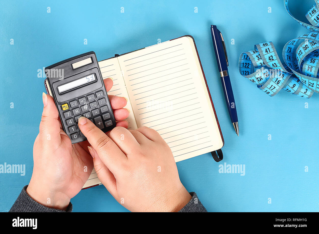 Healthy lifestyle concept with notepad. Weight loss or diet concept ...