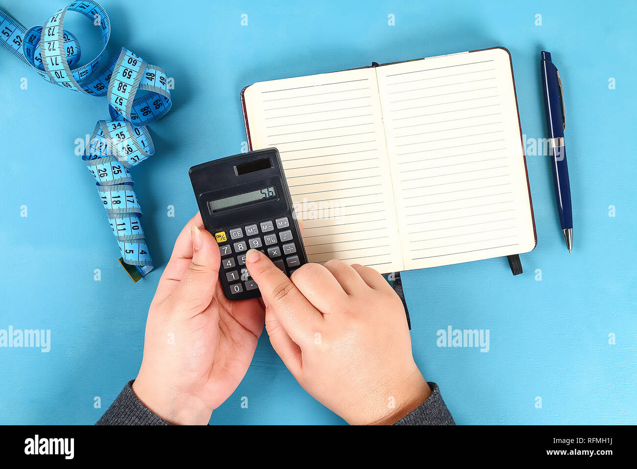 Healthy lifestyle concept with notepad. Weight loss or diet concept ...