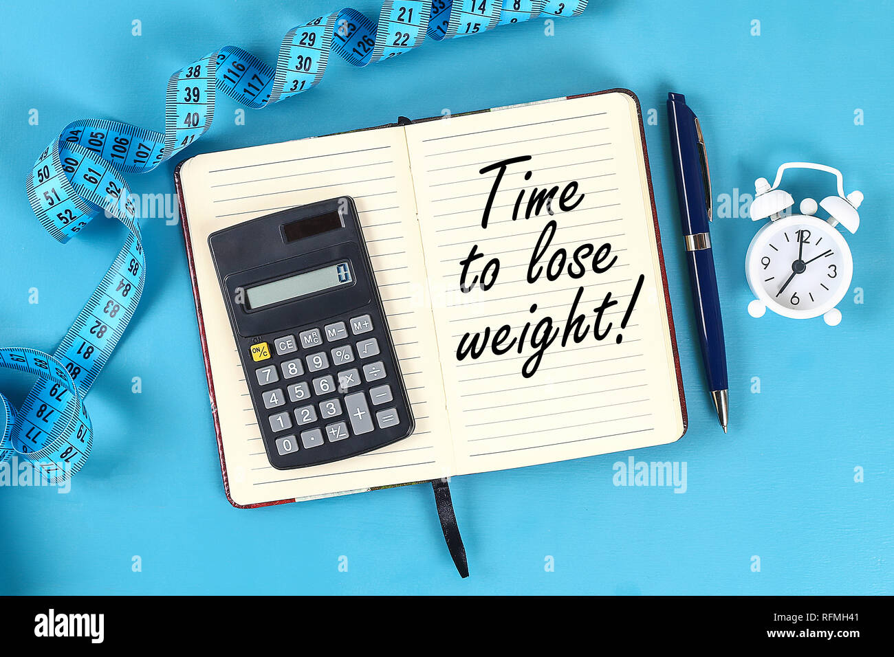 Healthy lifestyle concept with notepad. Weight loss or diet concept ...