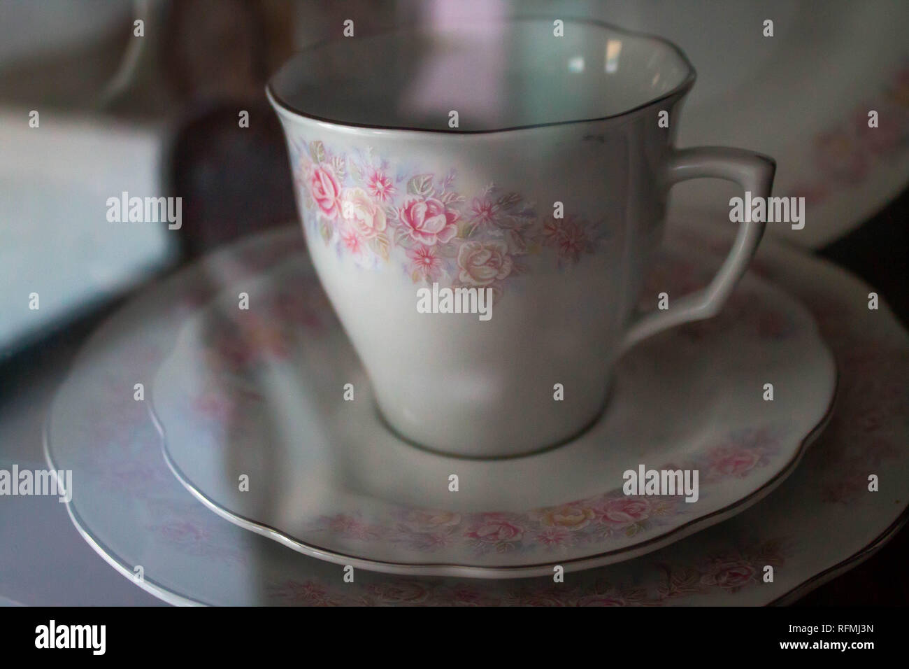 White Tea cup with roses Stock Photo - Alamy