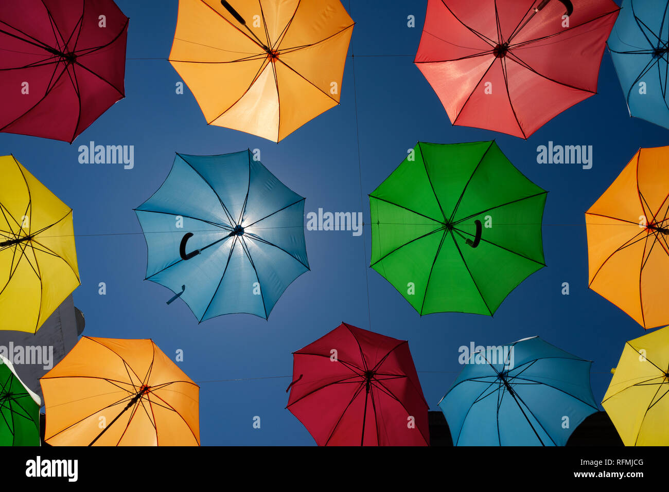 Colorful rainbow umbrellas hi-res stock photography and images - Alamy