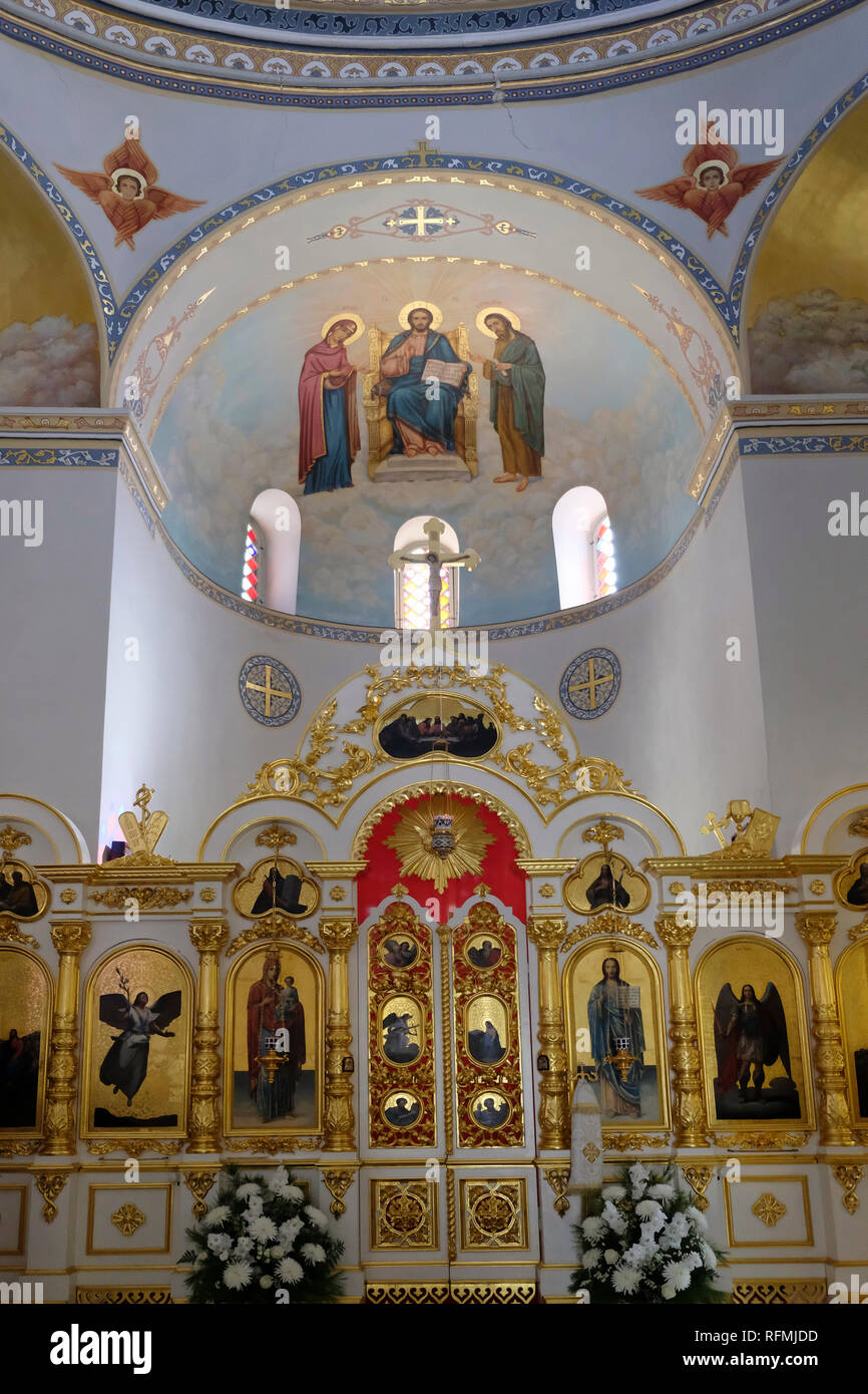 The iconostasis decorated with icons and religious paintings inside the Russian Orthodox Church ...