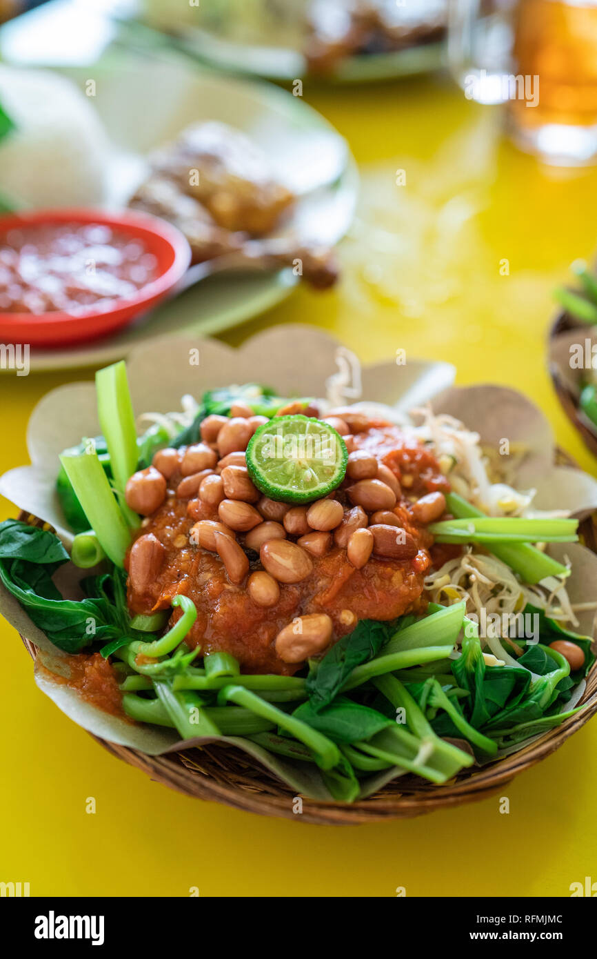 indonesian plecing kangkung dish Stock Photo - Alamy