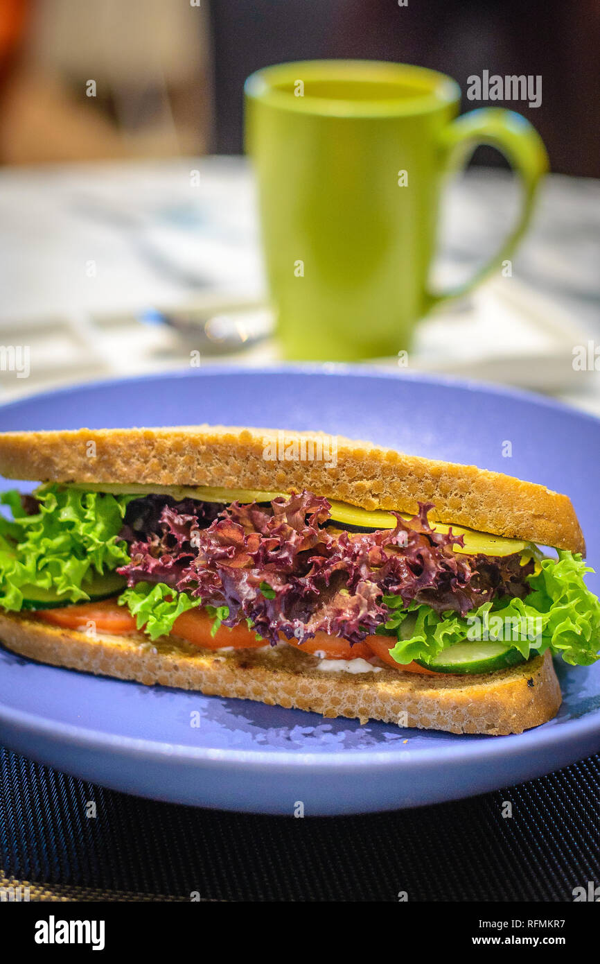 Beef Bacon and Cheddar on Rye sandwich with cafe latte Stock Photo - Alamy