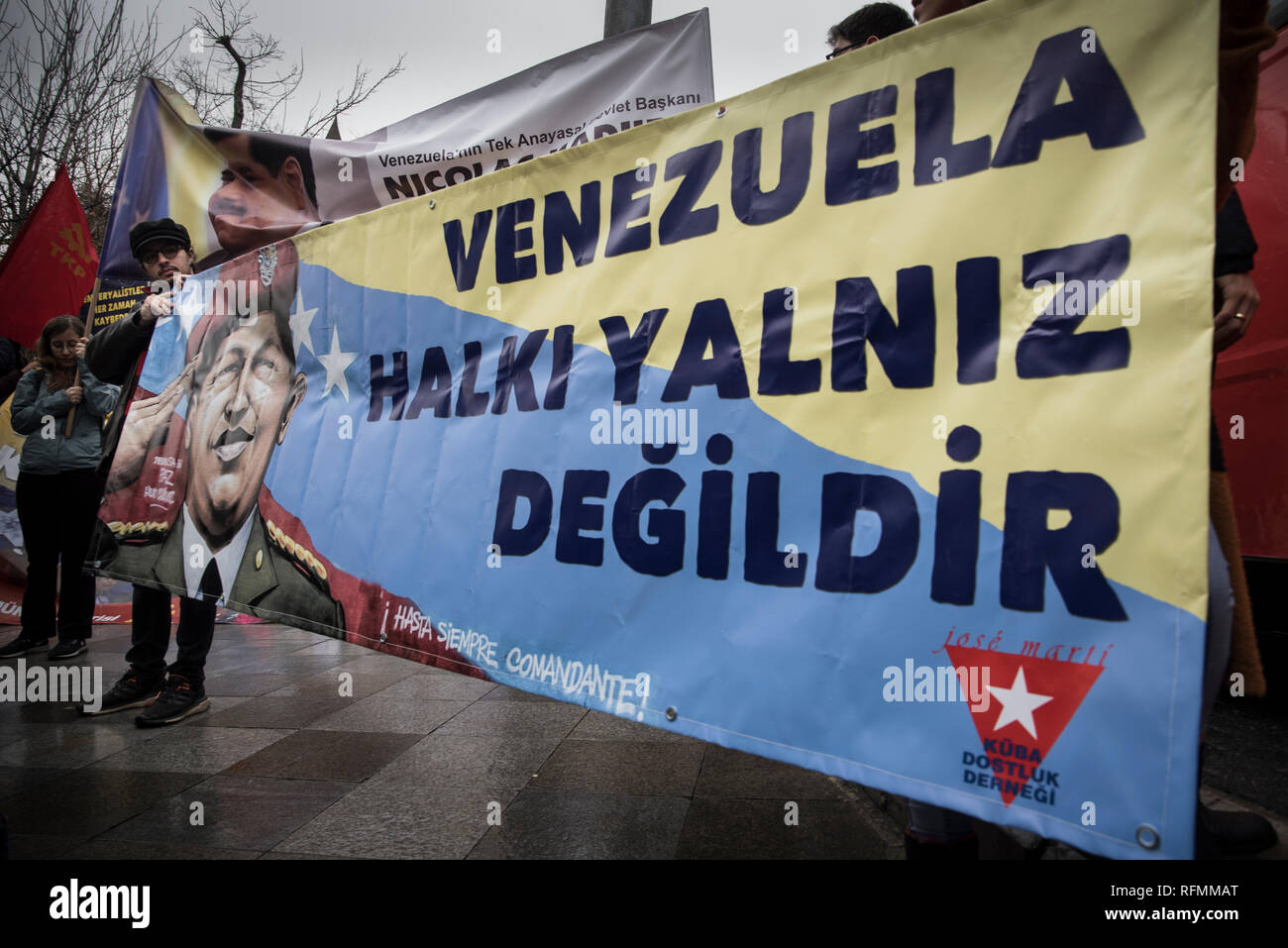 Protesters are seen holding a banner during the demonstration. The ...