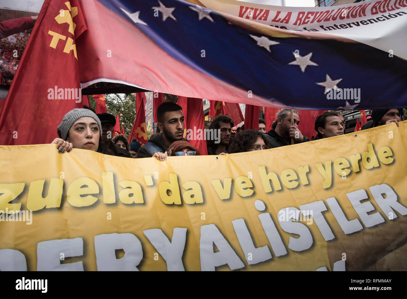 Protesters are seen holding a banner during the demonstration. The ...