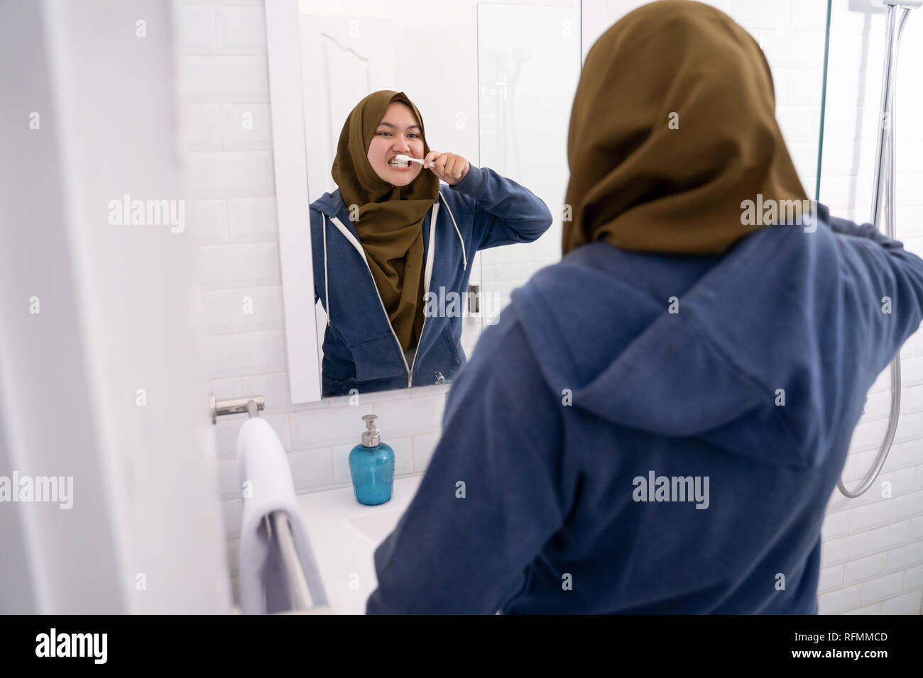 young woman hijab doing routine activities Stock Photo - Alamy