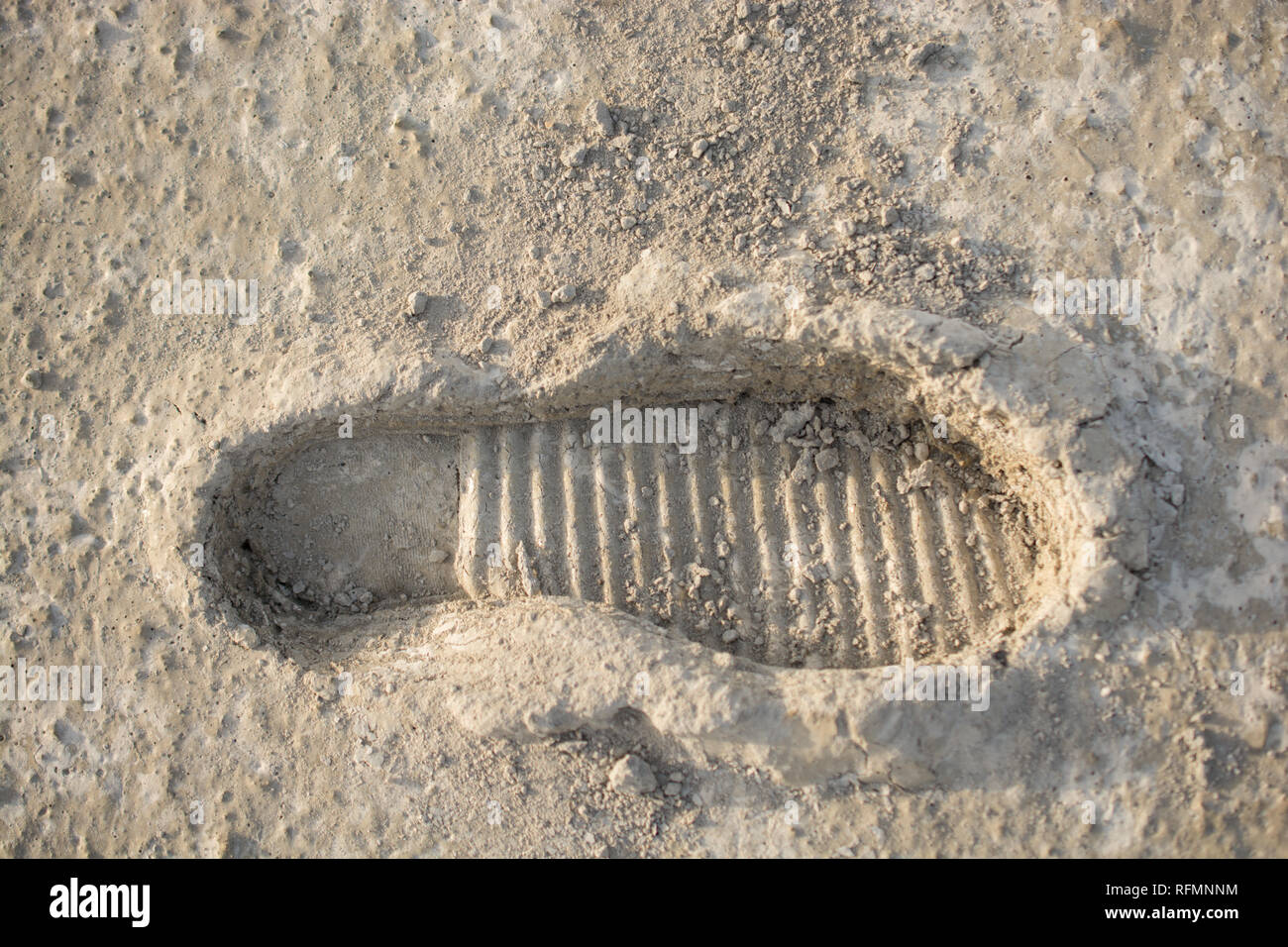 Footstep pattern seen on a concrete background Stock Photo - Alamy