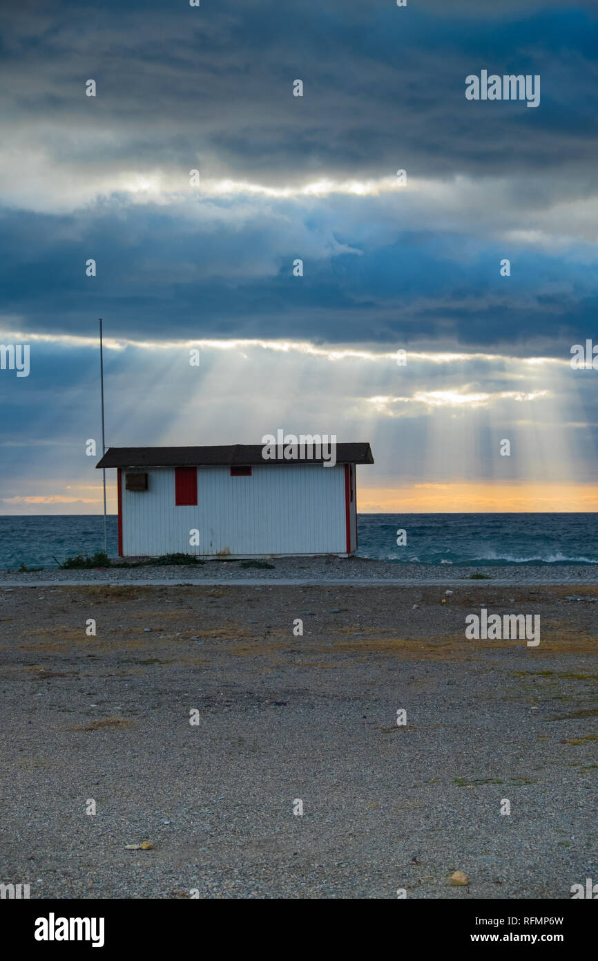 Storm clouds gathering above a simple shack in Salobrena Spain Stock ...