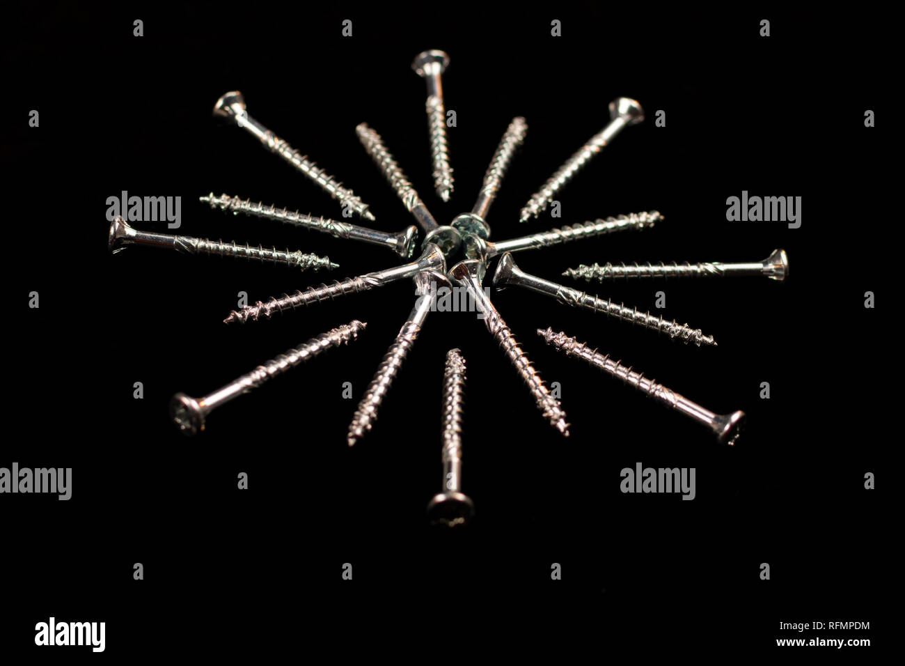 group of screws in a circular pattern Stock Photo - Alamy