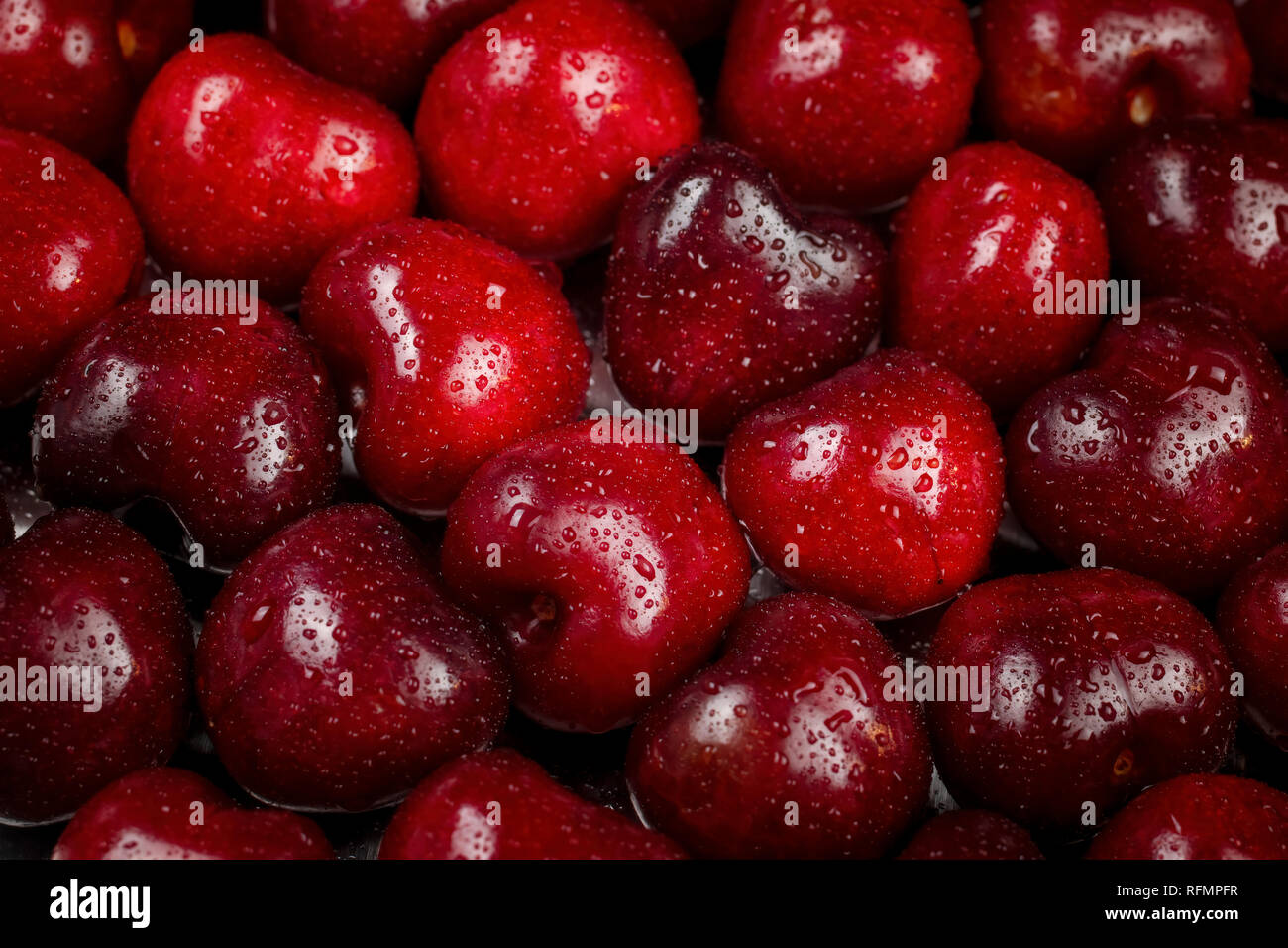 Shiny red cherries hi-res stock photography and images - Alamy