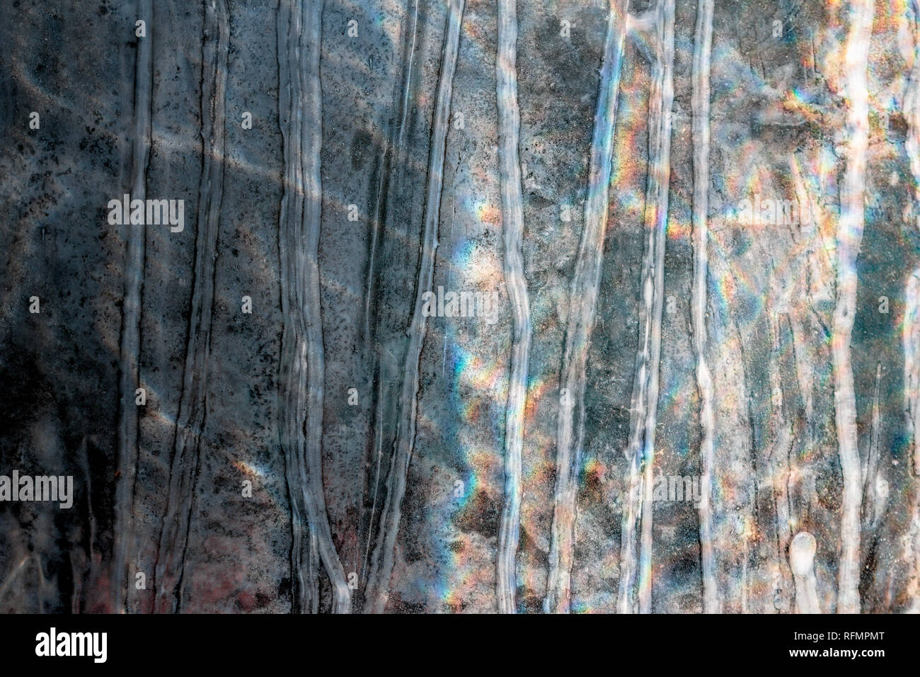 colorful refraction in a block of ice Stock Photo - Alamy