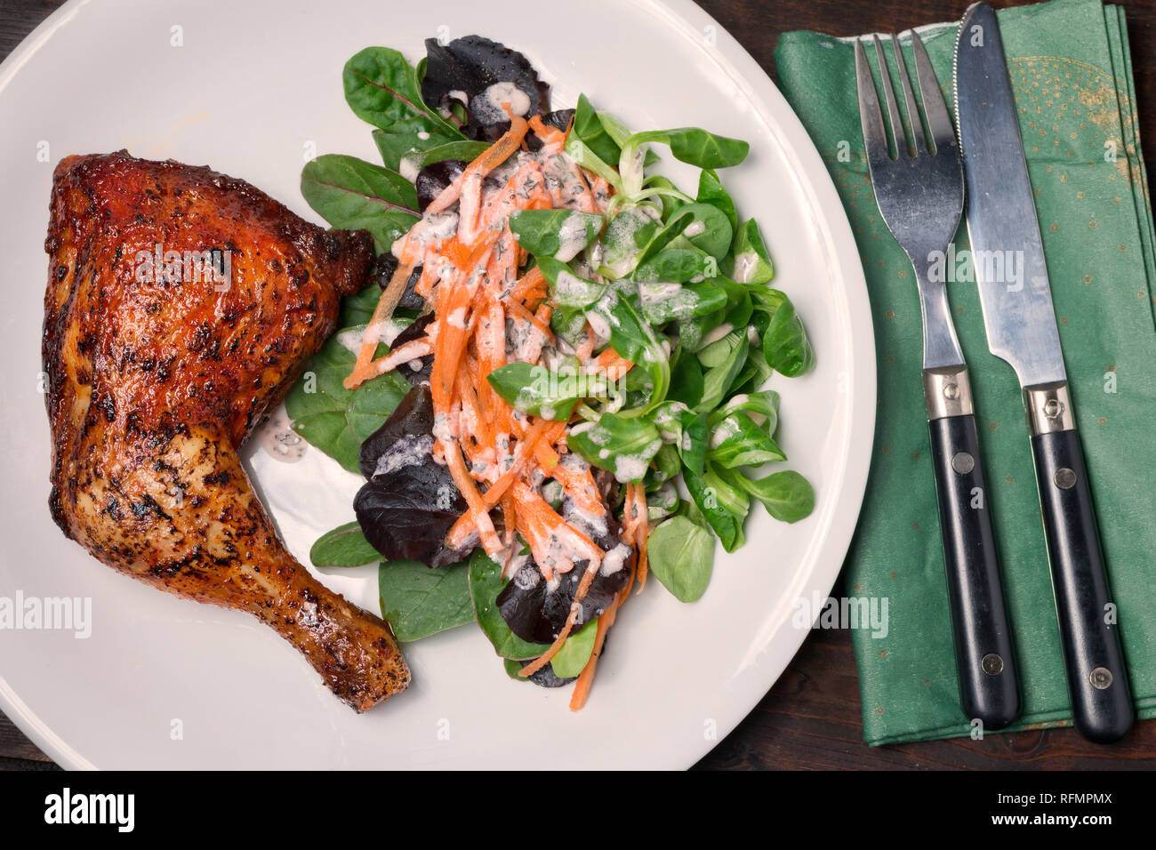 healthy lunch of grilled leg of chicken and salad Stock Photo - Alamy
