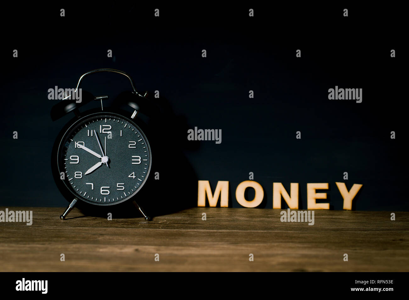 Time money clock text hi-res stock photography and images - Alamy